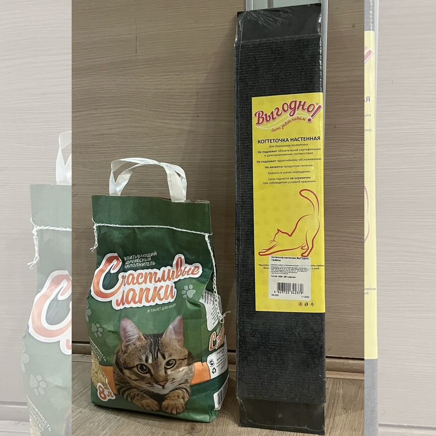 Когтеточка и наполнитель для кошки