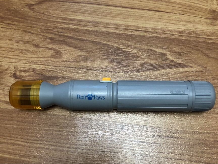 Триммер для подпилки когтей собаке и кошке