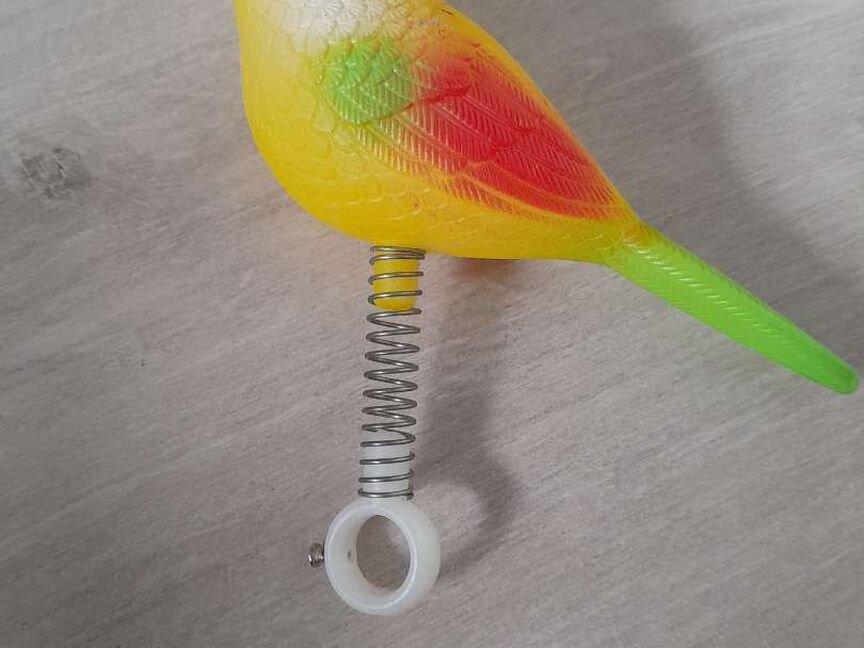 Игрушка для попугая