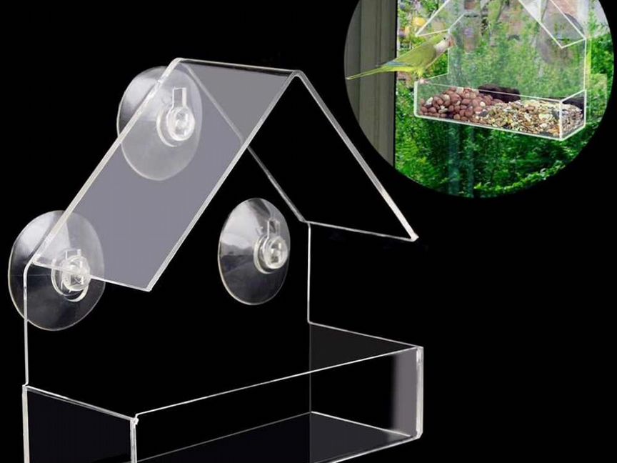 Прозрачная кормушка для птиц на окно