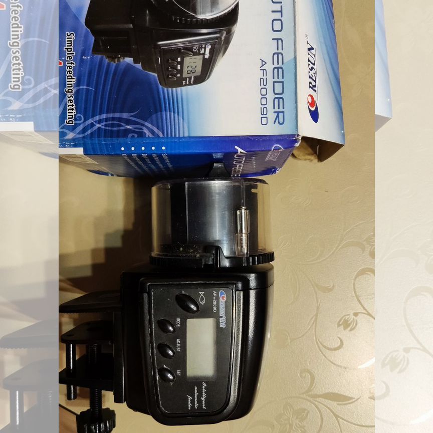 Автоматическая кормушка для аквариума