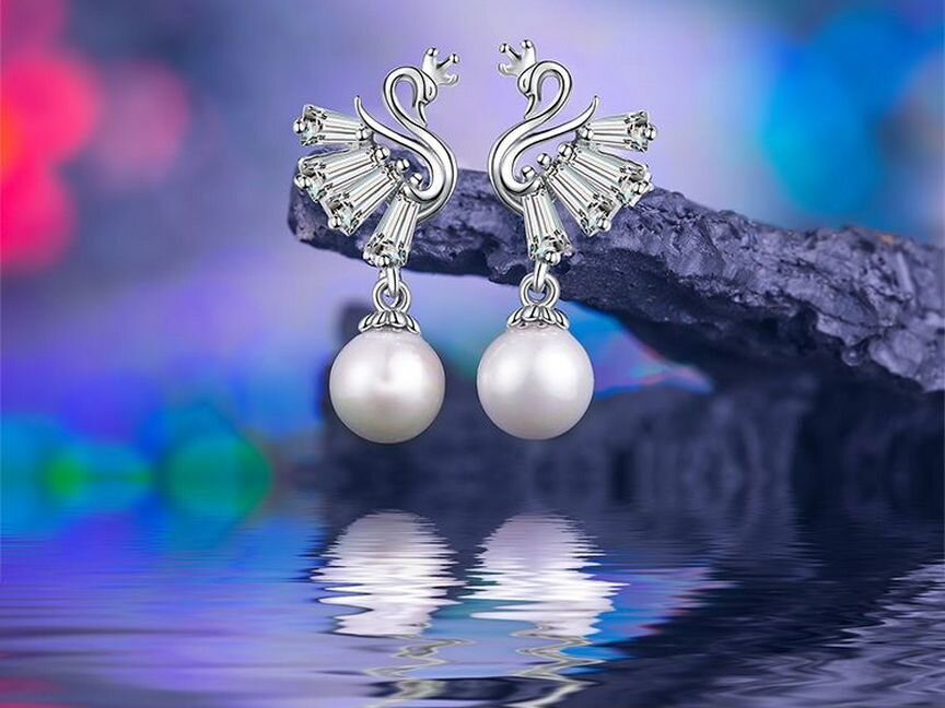 Лебеди с жемчугом