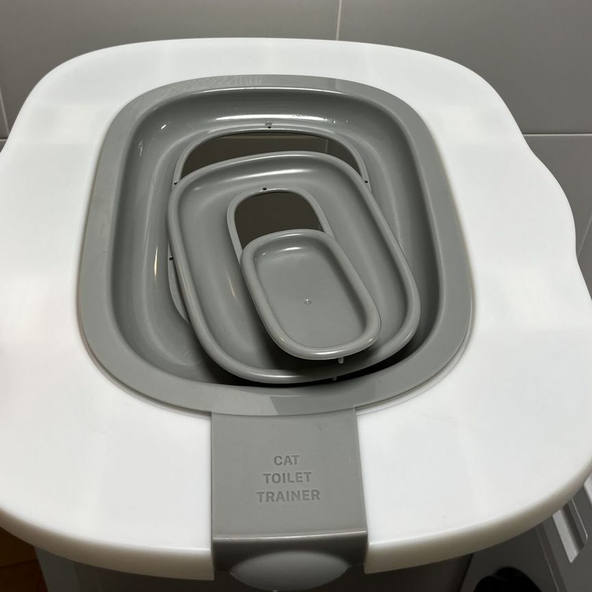 Многоразовая система приучения кошек к унитазу