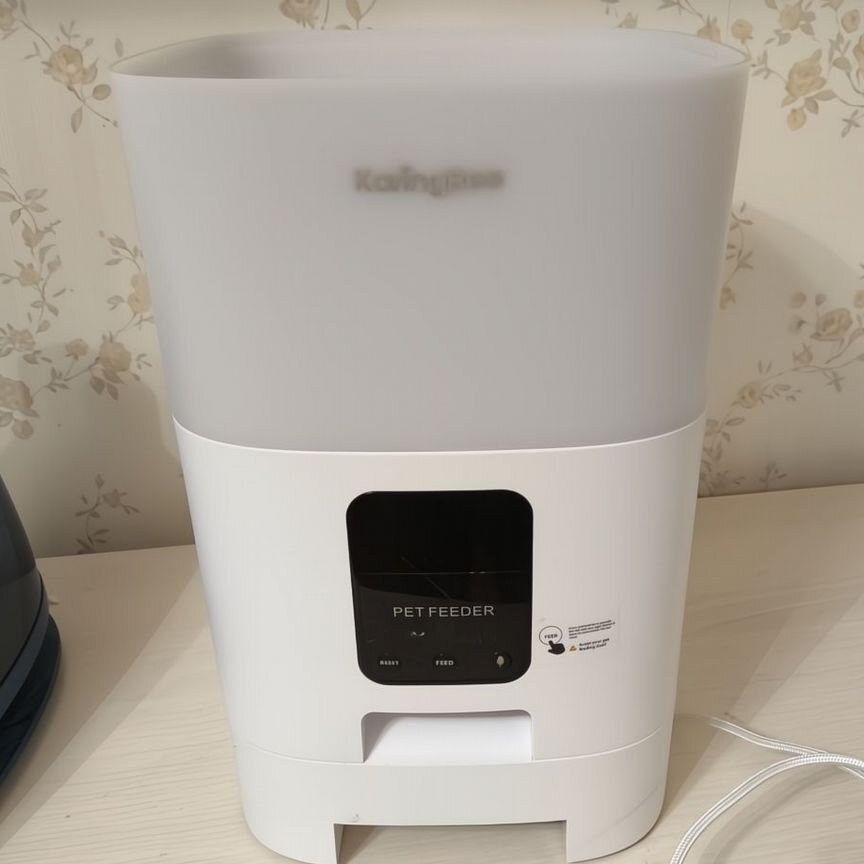 Автоматическая кормушка для животных