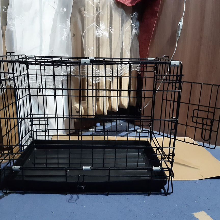 Продаю б/у клетку для кошек или собак