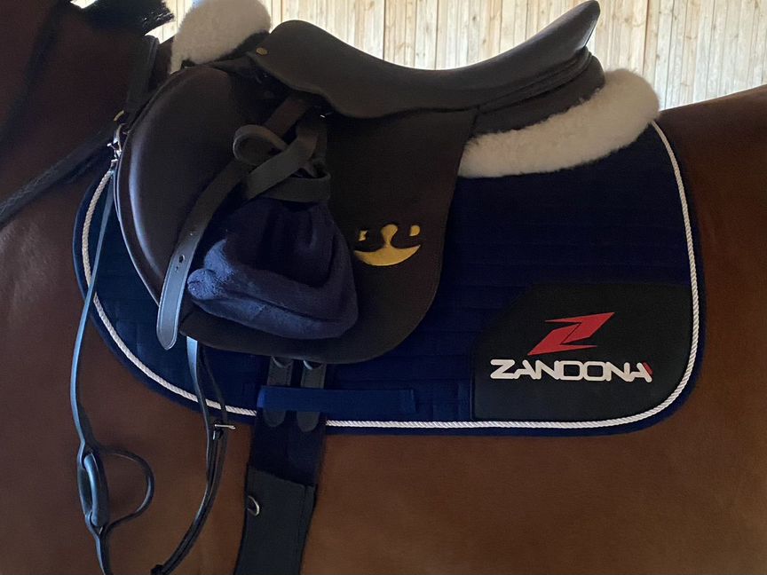 Седло для лошади